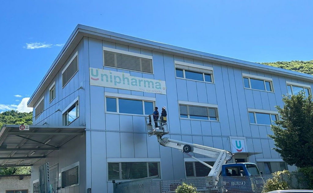 RE-BRANDING our BUILDING! | Unipharma